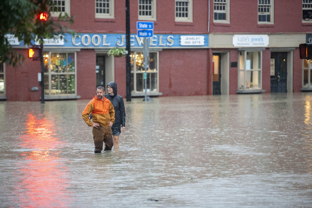 A surging river threatens Vermont’s capital as crews rescue more than ...